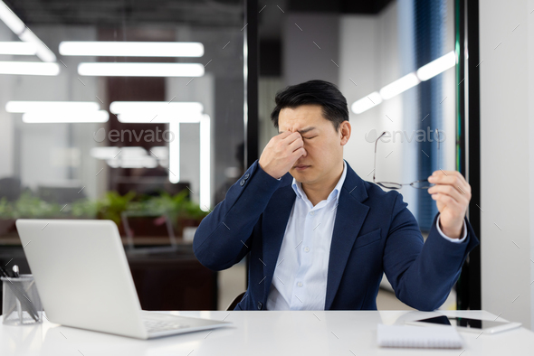 Overworked and overtired man has severe dizziness in head, businessman ...
