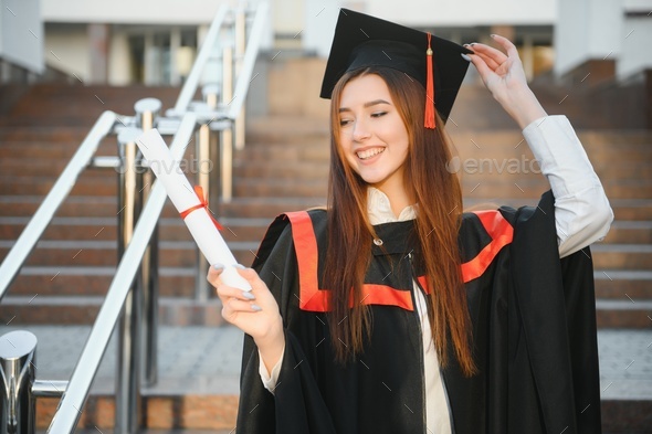 Happy graduation day for a young woman very beautiful with graduation ...