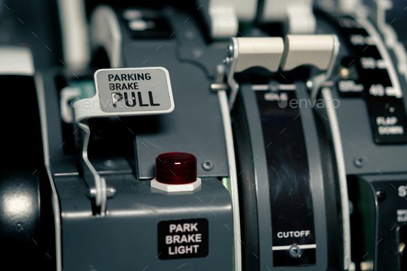 thrust lever in the cockpit of an airplane a close-up view of flight on ...