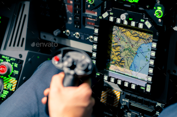 an airplane cockpit Center panel with main flight display navigation ...