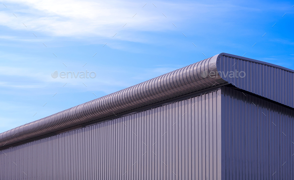 Curve corrugated metal roof eaves with gray aluminum wall of modern ...