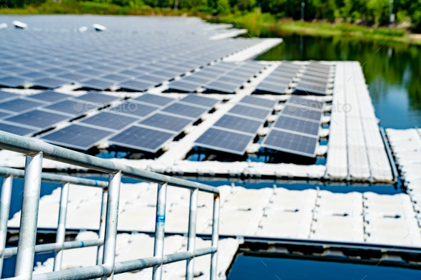 Floating solar panels providing renewable energy. Aerial view floating ...