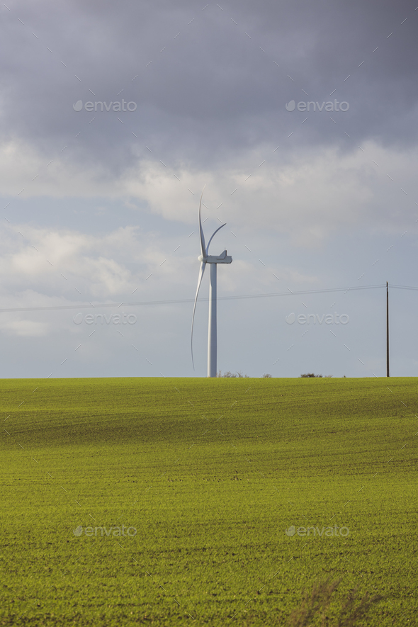 Modern windmills along the road in countryside Stock Photo by ...
