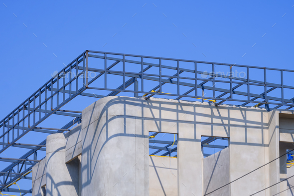 Precast bare concrete wall with roof beam of modern office building ...