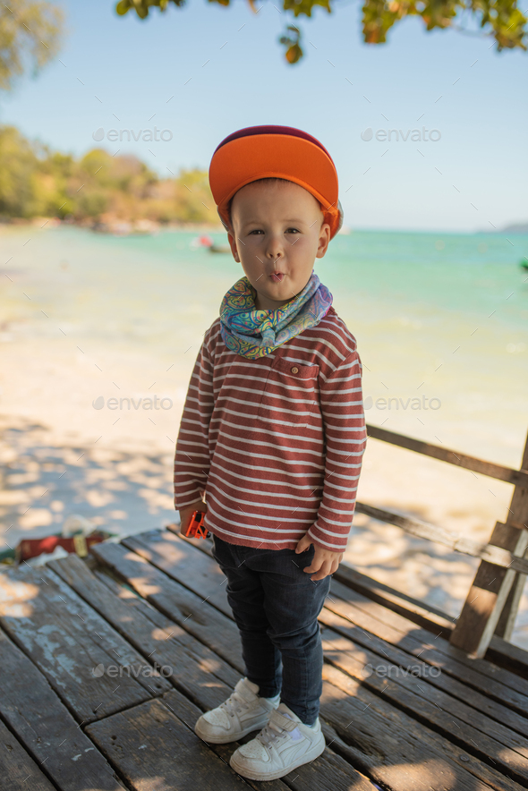 Fashion child. Happy boy model. Stylish little boy baseball. Handsome ...
