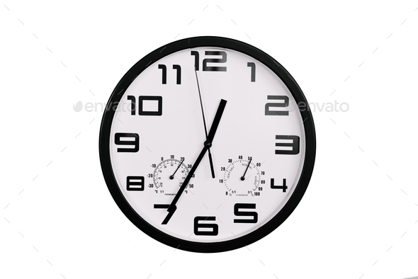 Clock with arabic numerals on wall shows 12:35 , 00:35 Stock Photo by ...