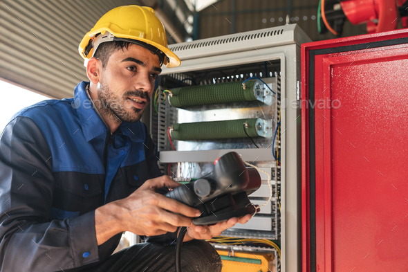 engineer worker checking and running a diagnostic test using electronic ...