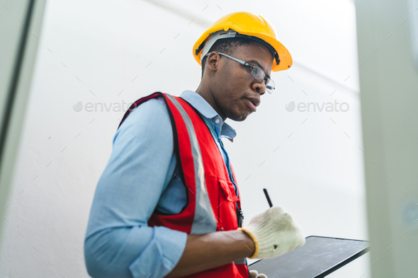 Professional engineering worker programmable logic controller to manage large machine Stock ...