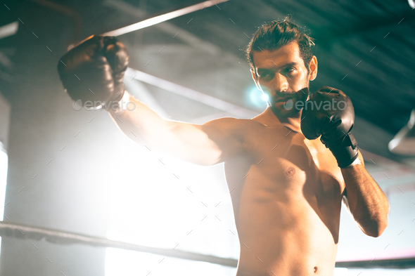 Boxing gym, man portrait and boxer pose technique for protection in mma ...
