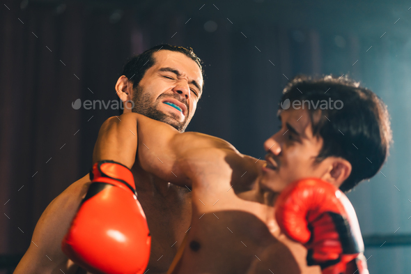 Gym atmosphere, Two professional fighters posing sport boxing ring ...