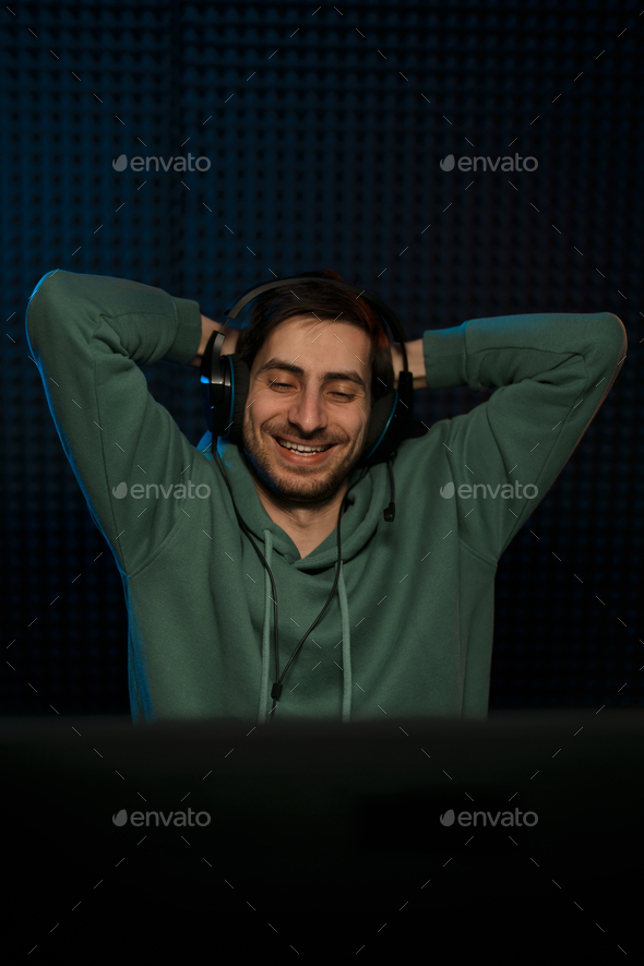 Relaxed Gamer Enjoying a Break Stock Photo by arthurhidden | PhotoDune