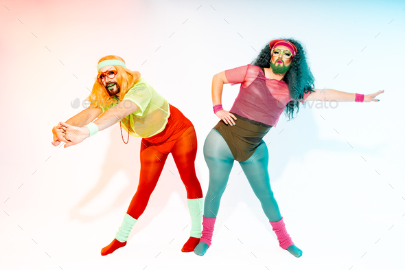 Smiling drag queens dancing in studio Stock Photo by galdricp | PhotoDune
