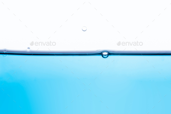 Calm surface of transparent blue liquid with one bubble Stock Photo by ...
