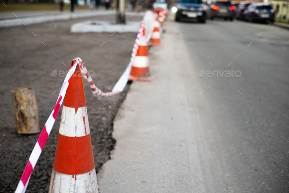 Under construction board sign on the closed road with arrow sign and ...