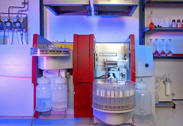 High-tech laboratory equipment illuminating the room with a blue glow ...