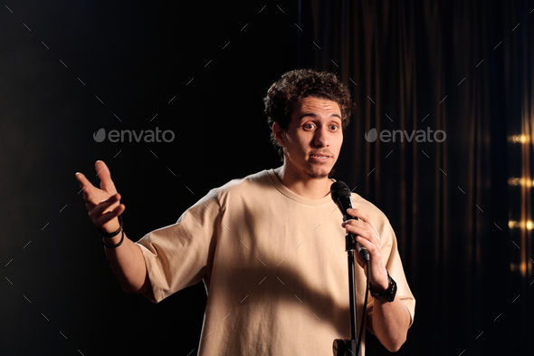 Actor pronouncing monologue on stage Stock Photo by Pressmaster | PhotoDune