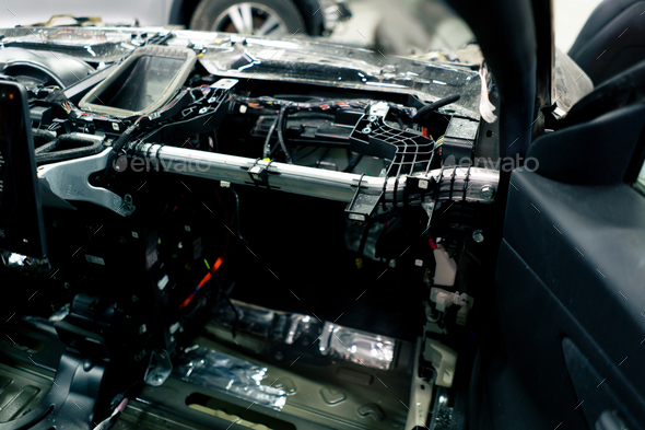 close-up a disassembled part of a car before a complete repair after an ...