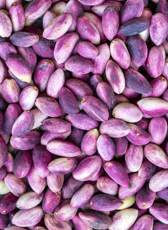 Fresh raw pistachio nuts in shell natural background. Stock Photo by ...