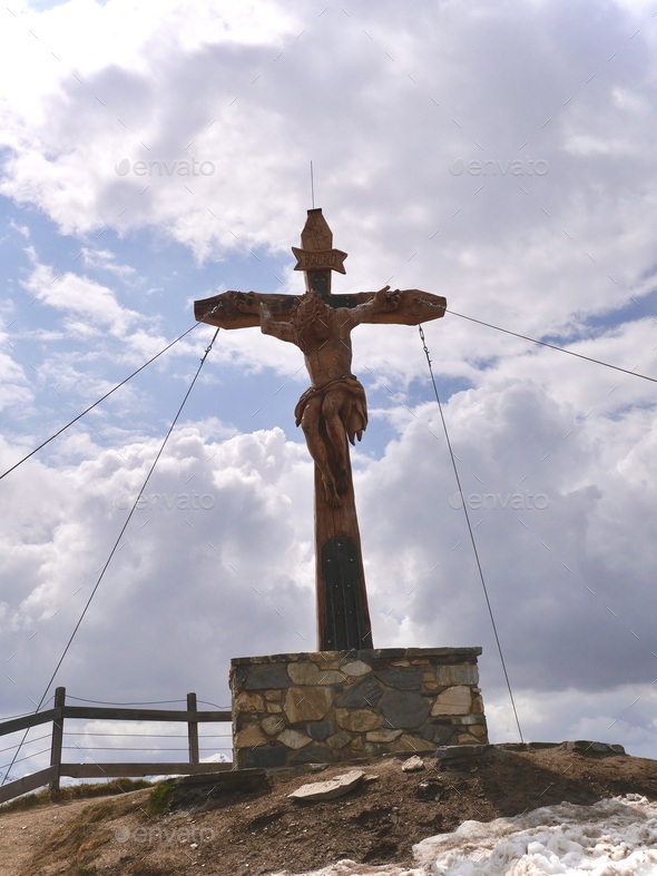 Sculpted Serenity: Wooden Masterpiece of Jesus Christ in a Cross Stock ...