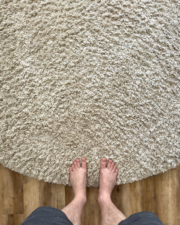 Feet On Shag Pile Floor Rug Stock Photo by THP-Creative | PhotoDune