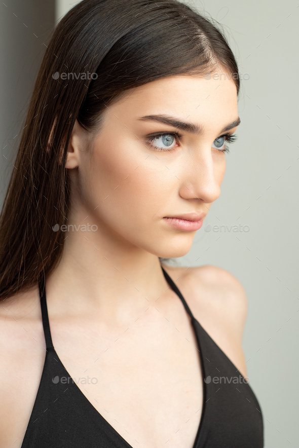 young woman model snapshot lingerie on white background. Classic poses ...