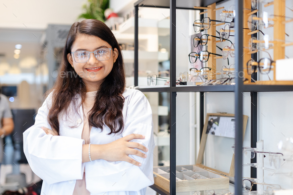 portrait Indian woman arm crossed professional optician selling. Stock ...