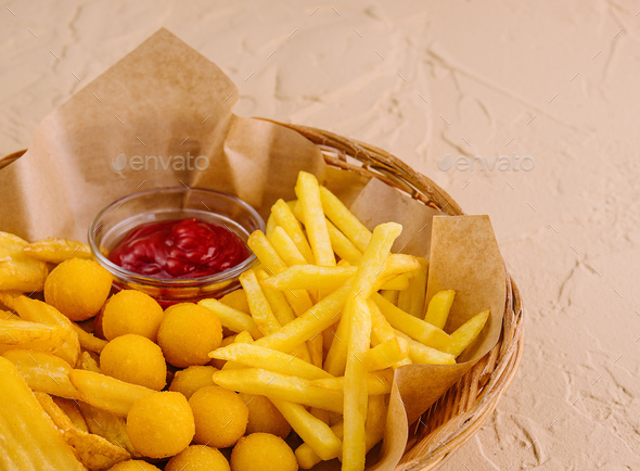 Different types of fried potatoes, such as french fries, roast potatoes ...