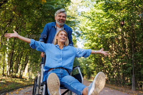 Inclusive Romance: Handicapped Couple Cherishing Time Outdoors Stock ...