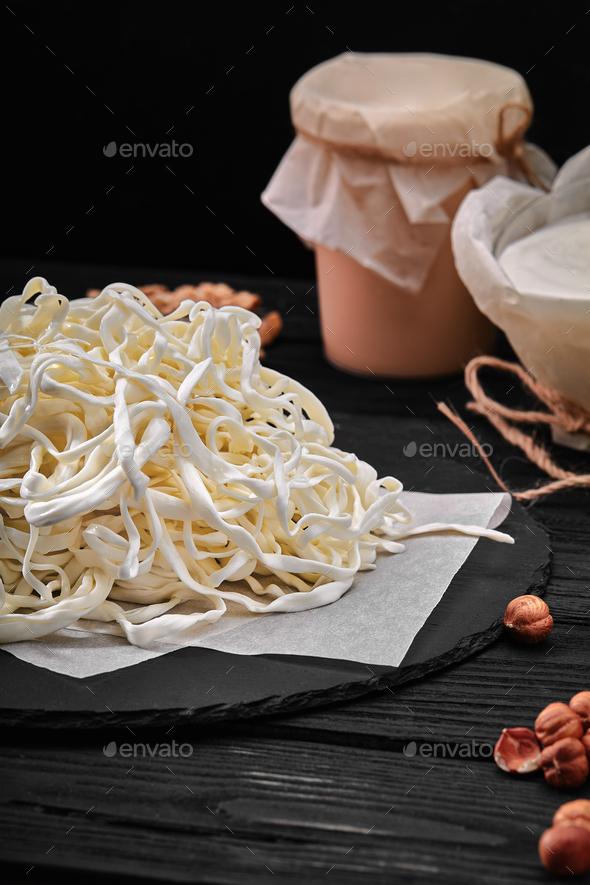 Cheese Chechil. Homemade soft cheese production. farm prodact Stock ...