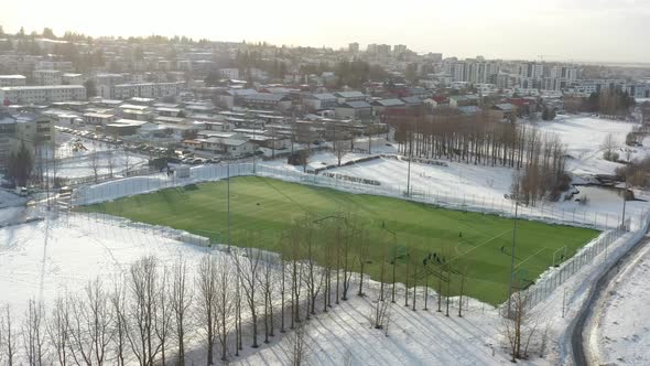 Shot over a Vibrant Green Football Field in Iceland, Soccer Pitch ...