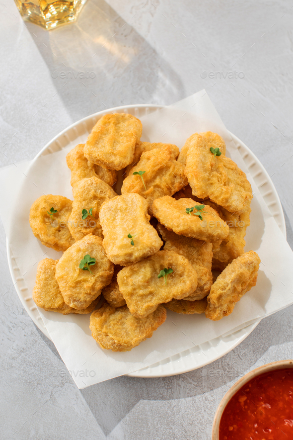 Plate of chicken nuggets on table, fast food dish Stock Photo by ...