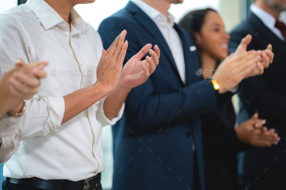 Happy colleagues business group applauding, partner team clapping to their company teamwork ...