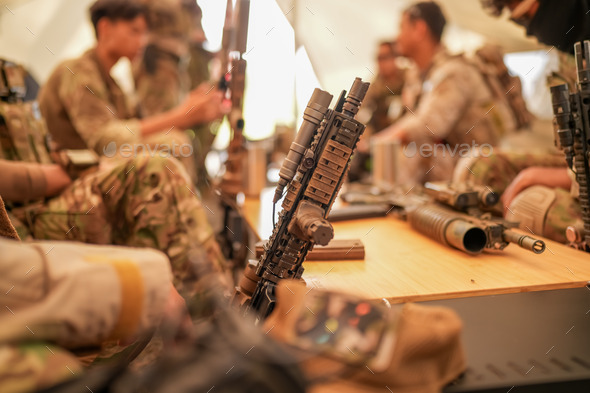 US Army Rangers group with weapons. army , planning strategy or ...
