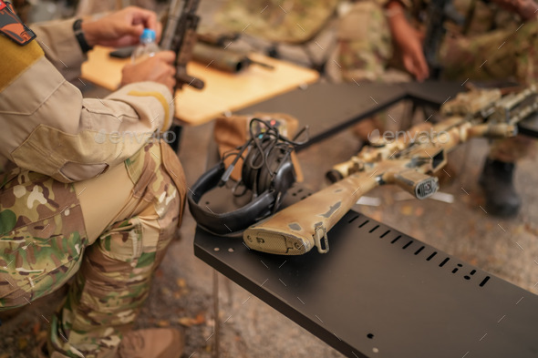 US Army Rangers group with weapons. army , planning strategy or ...