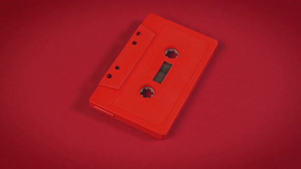 Old Red Cassette Tape on a Minimalist Background, Stock Footage | VideoHive