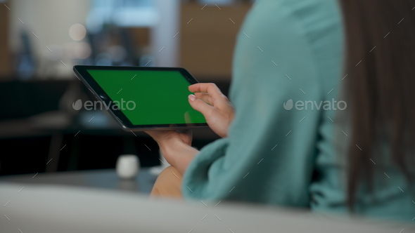 Leader fingers swiping mockup tablet at office closeup. Woman scrolling ...