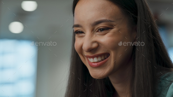 Excited developer having fun at lounge zone closeup. Happy woman face ...