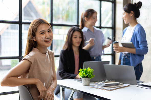 Group portraits of colleagues in the workplace. Stock Photo by wasant1