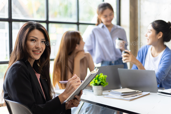 Group portraits of colleagues in the workplace. Stock Photo by wasant1