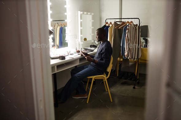 Black Man Reading Script Stock Photo by seventyfourimages | PhotoDune