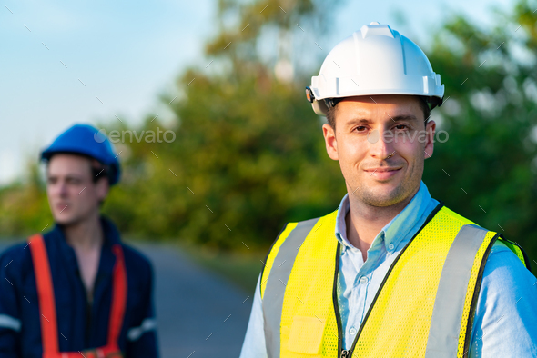 professional engineer and construction foreman team person with safety ...