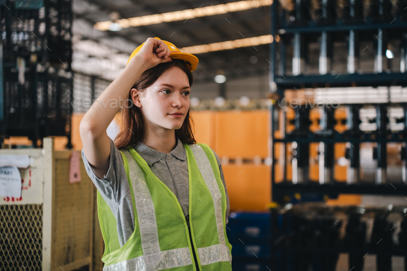 woman engineer inspection check control heavy machine robot arm ...