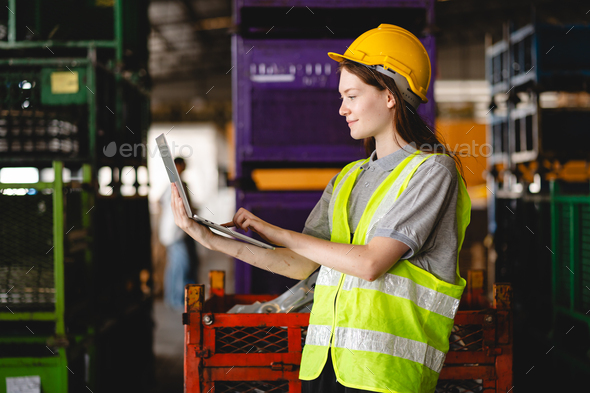 woman engineer inspection check control heavy machine robot arm ...