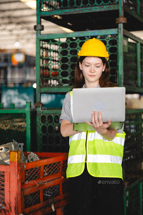 woman engineer inspection check control heavy machine robot arm ...