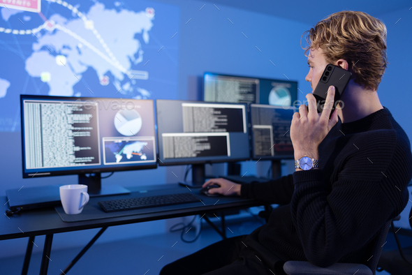 Cyber Security Control Center Operator in Phone Call Working. Multiple ...