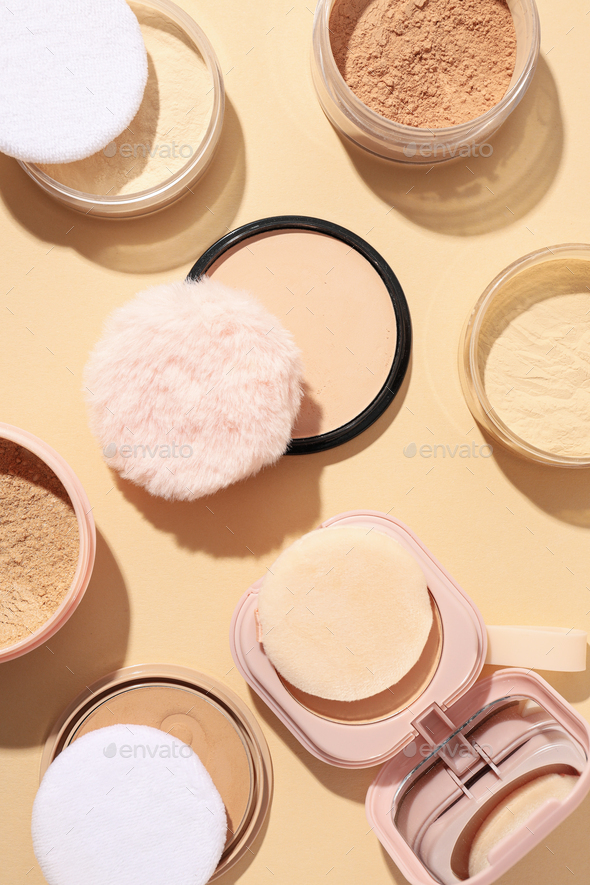 Bottles of face powder, different shades, on a pastel background. Stock ...