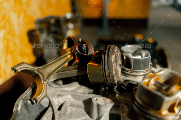 close up piston and connecting rod on the table disassembled engine ...