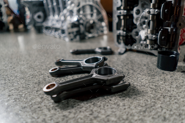 close up piston and connecting rod on the table disassembled engine ...