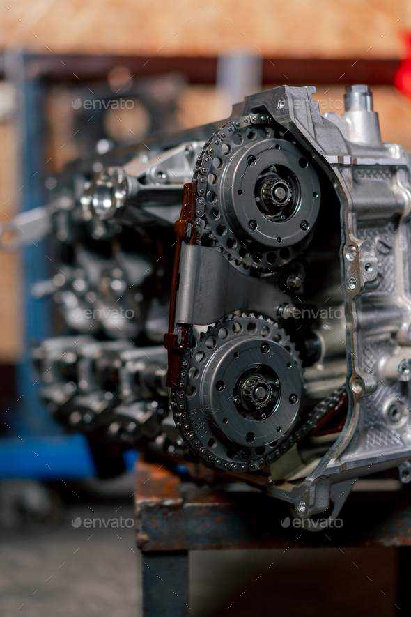 assembled engine block on table the mechanic opened the locking valve ...