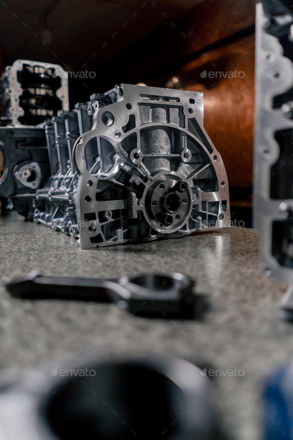 engine block on the table the mechanic opened the locking valve ...